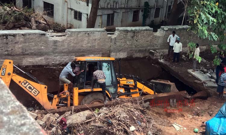 The concrete floor collapsed and the JCB machine fell into the canal ...