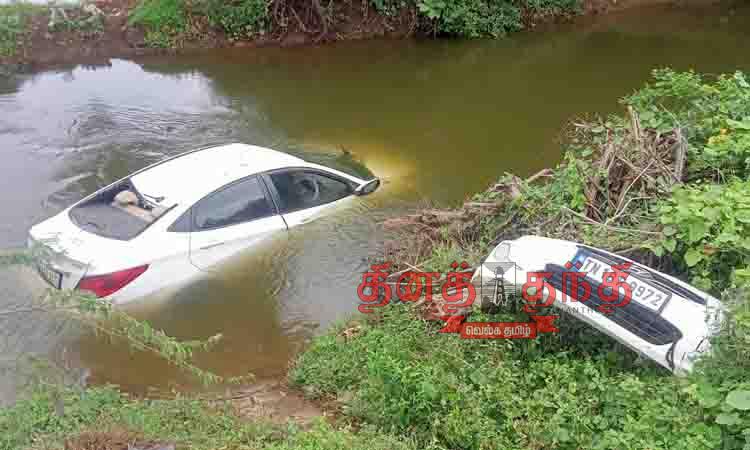 A car submerged in a canal; Police investigation | வாய்க்காலில் மூழ்கி ...