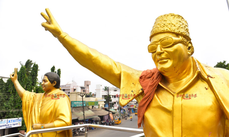 Saffron scarf put on MGR's statue in Madurai | எம்.ஜி.ஆர். சிலைக்கு ...