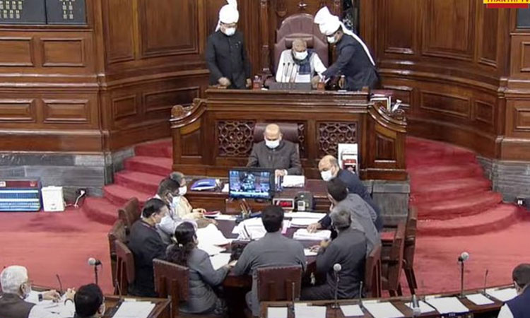 Members of both Houses of Parliament wear face masks and participate ...
