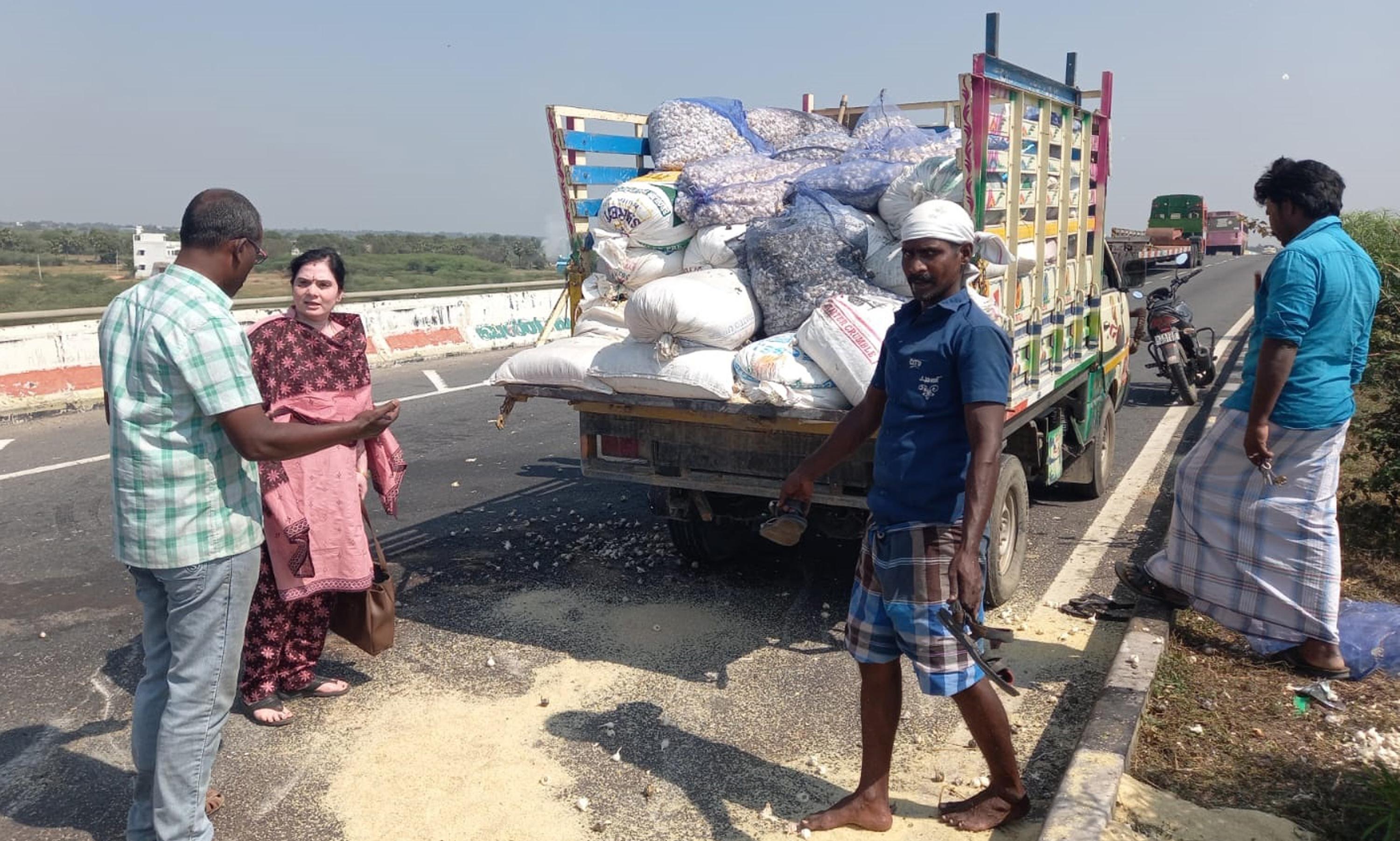 A mini van transporting ration rice overturned in an accident | ரேஷன் ...