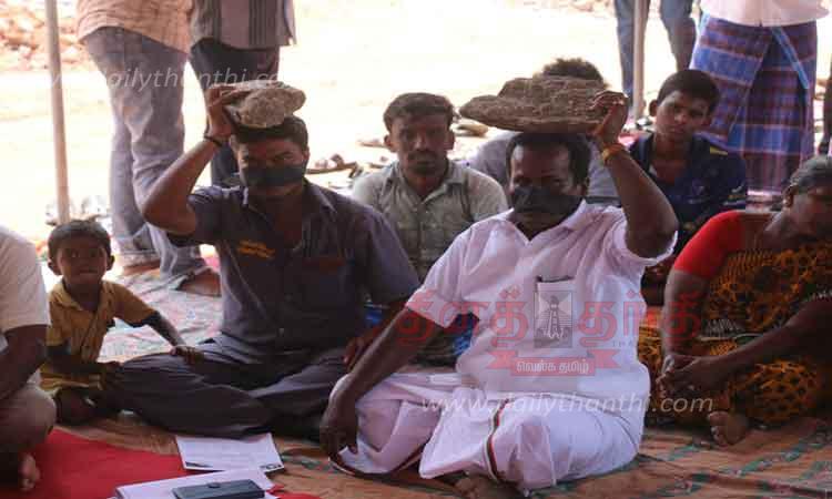 There was commotion due to people carrying stones on their heads to the ...