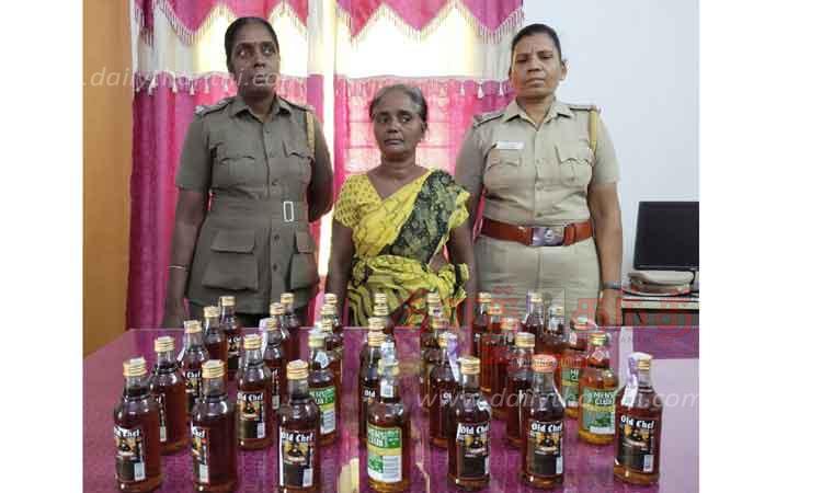 Alcohol seller arrested | மதுவிற்ற பெண் கைது
