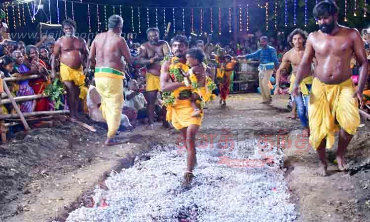 A devotee who descended into the flower pit | பூக்குழி இறங்கிய பக்தர்
