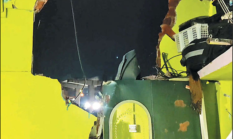 A house collapsed after being hit by a giant drilling machine during ...