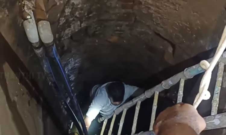 A person who fell into a 100-feet deep well after being chased by a dog ...